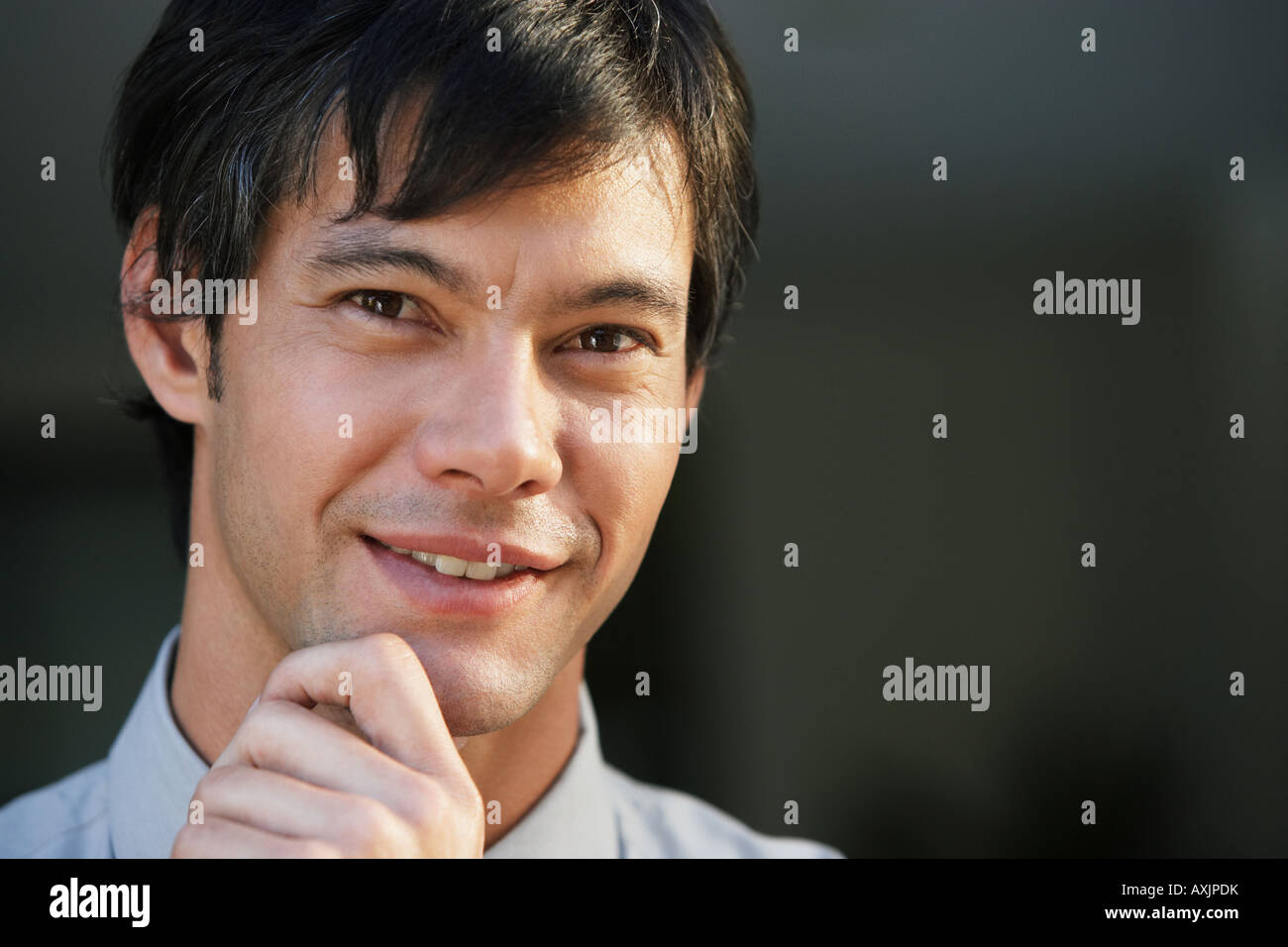 Close up of South American man smiling Stock Photo - Alamy