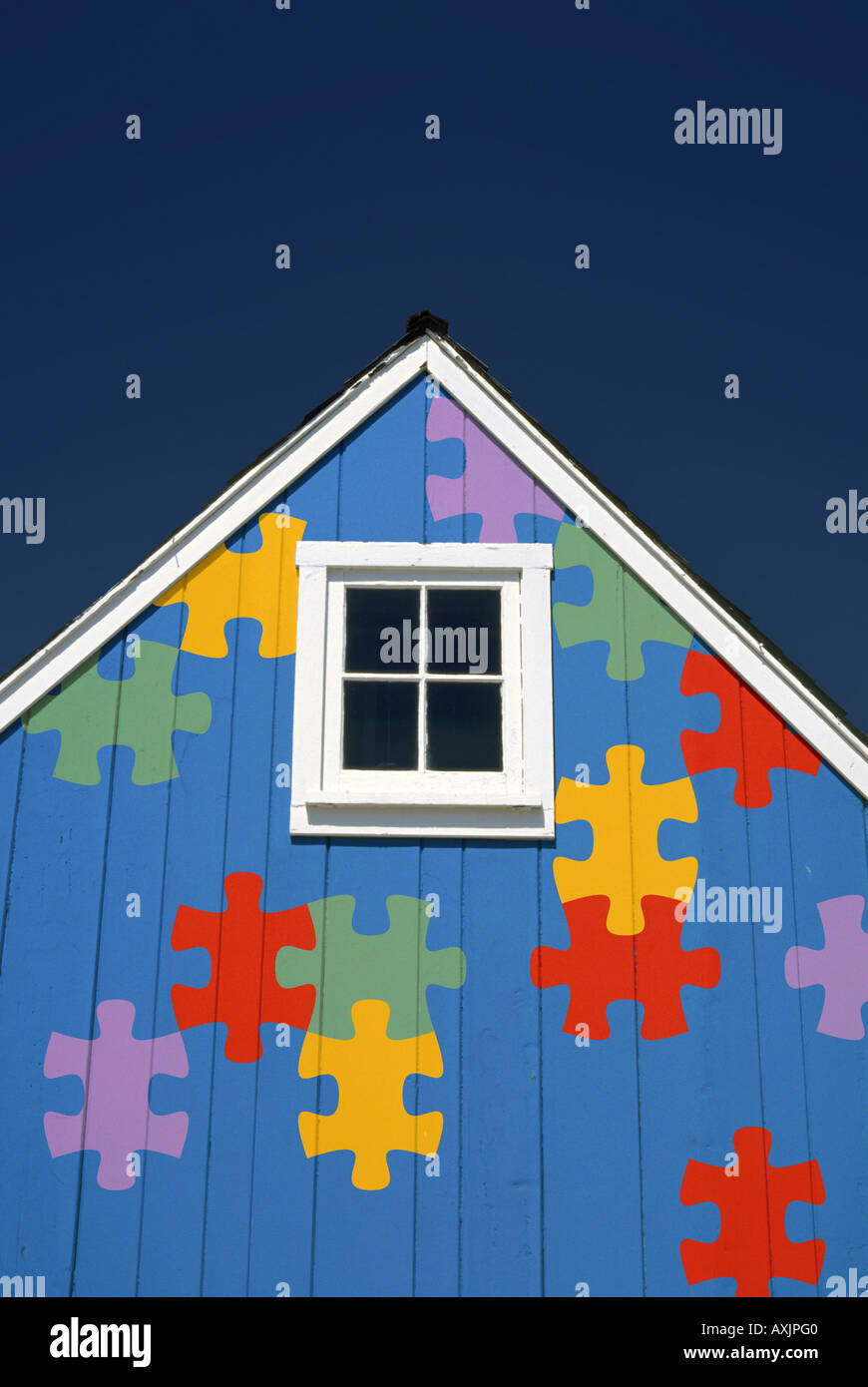 Little blue house gable with white square little window and jig saw ...