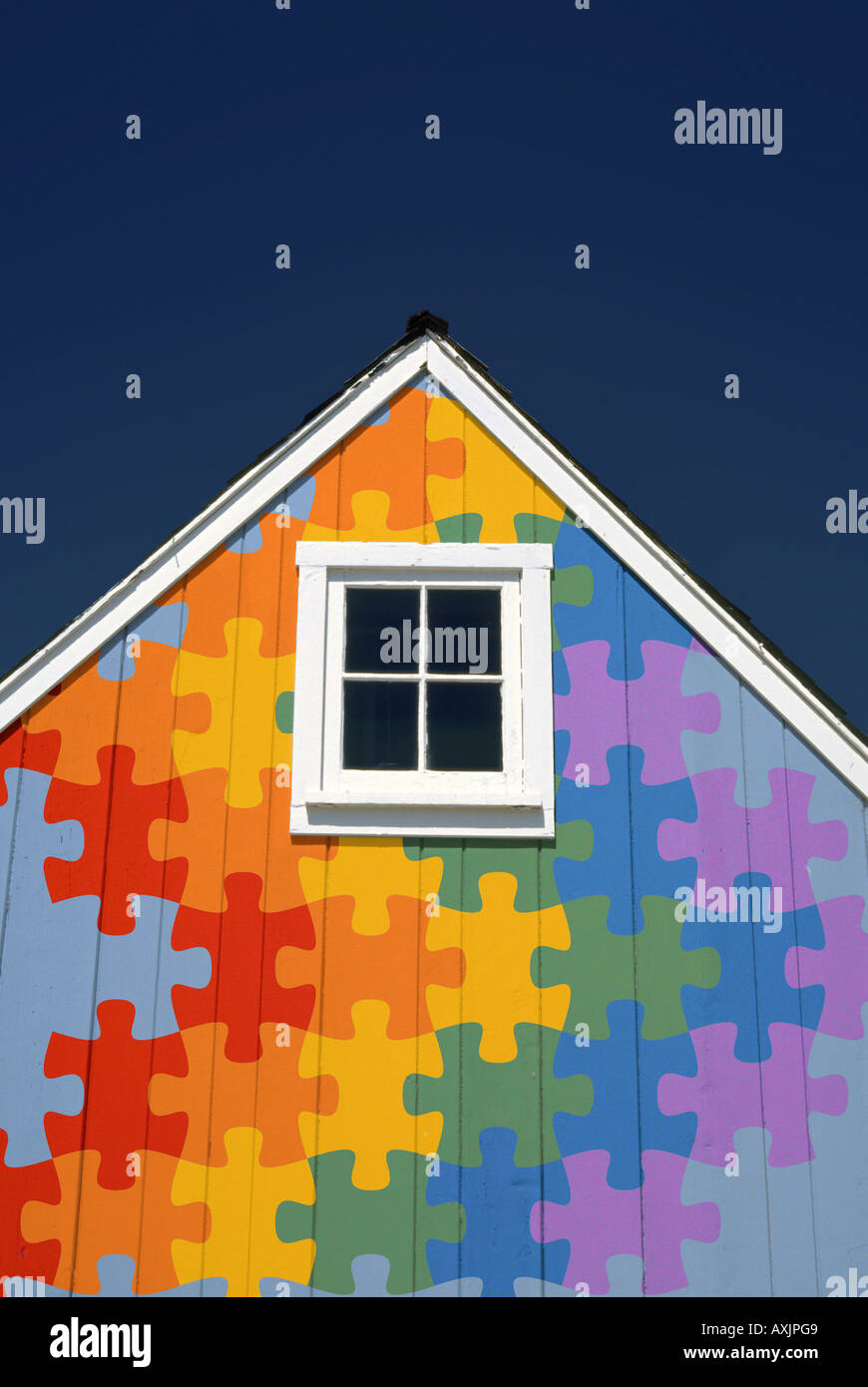 Little blue house gable with white square little window and jig saw ...