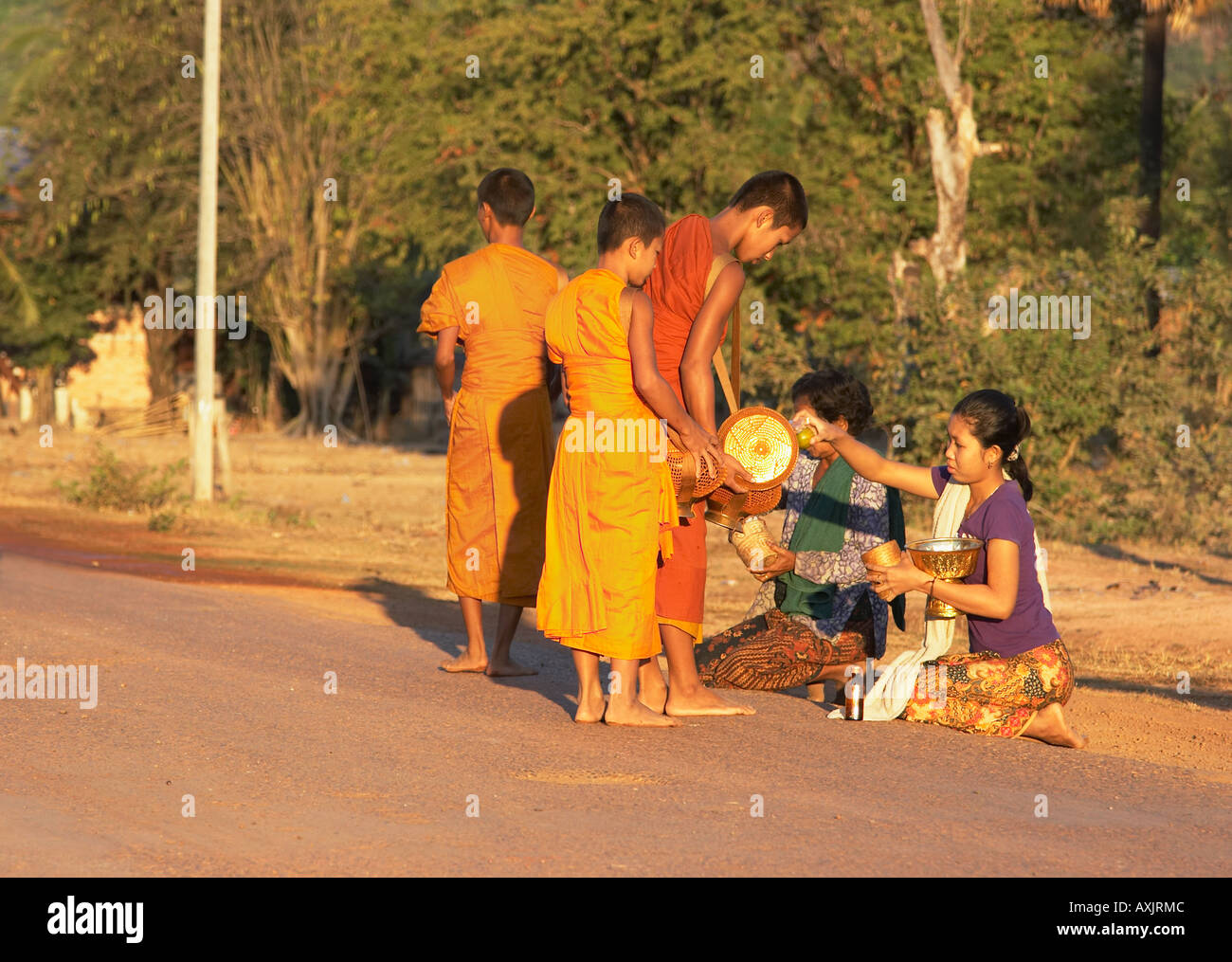 Giving of alms hi-res stock photography and images - Alamy