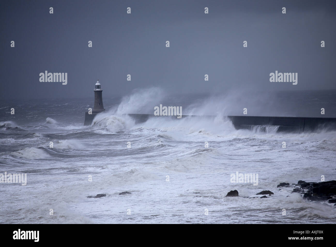 Lighthouse being smashed by waves Stock Photo - Alamy