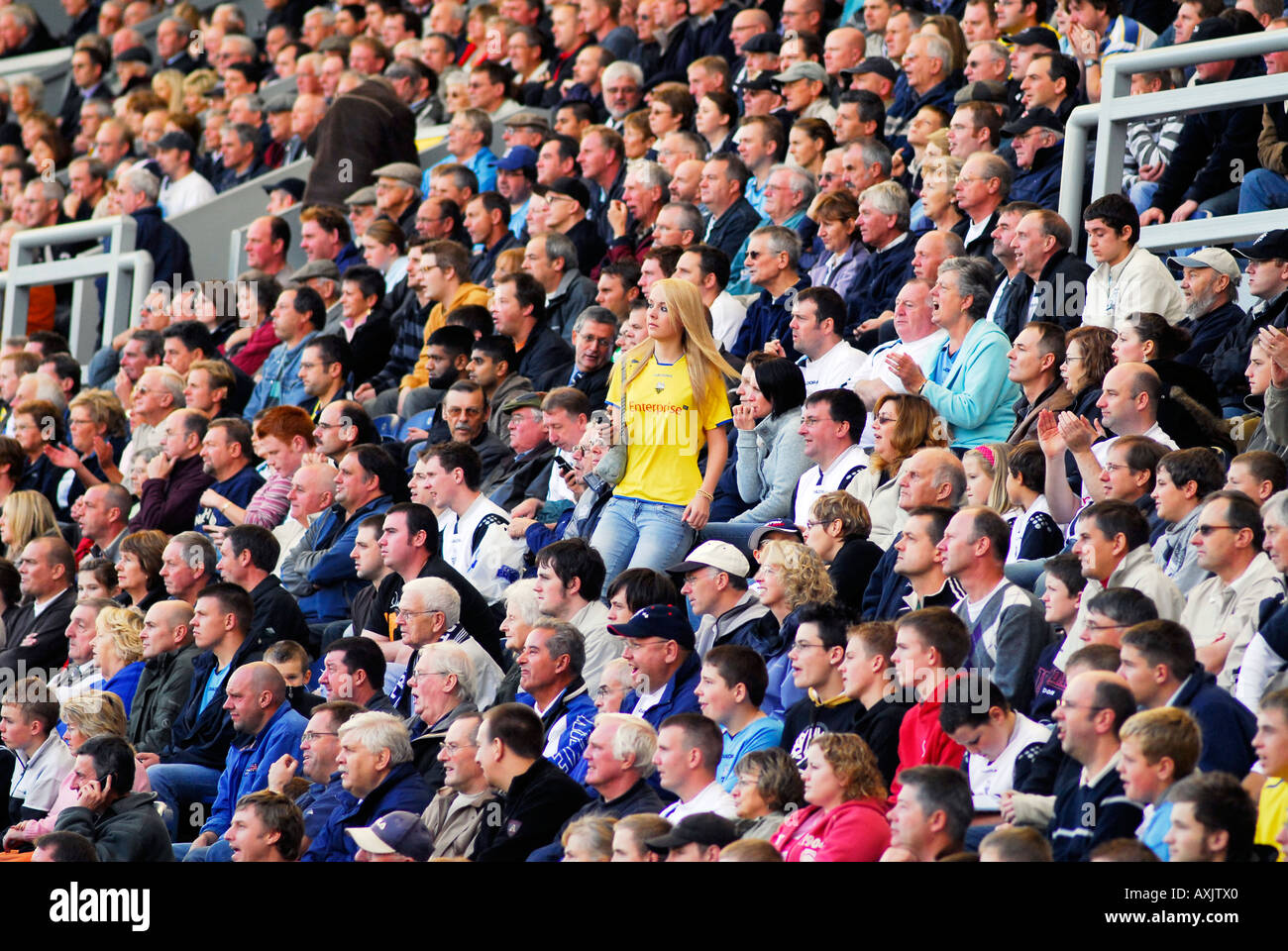 Girl in crowd Stock Photo - Alamy
