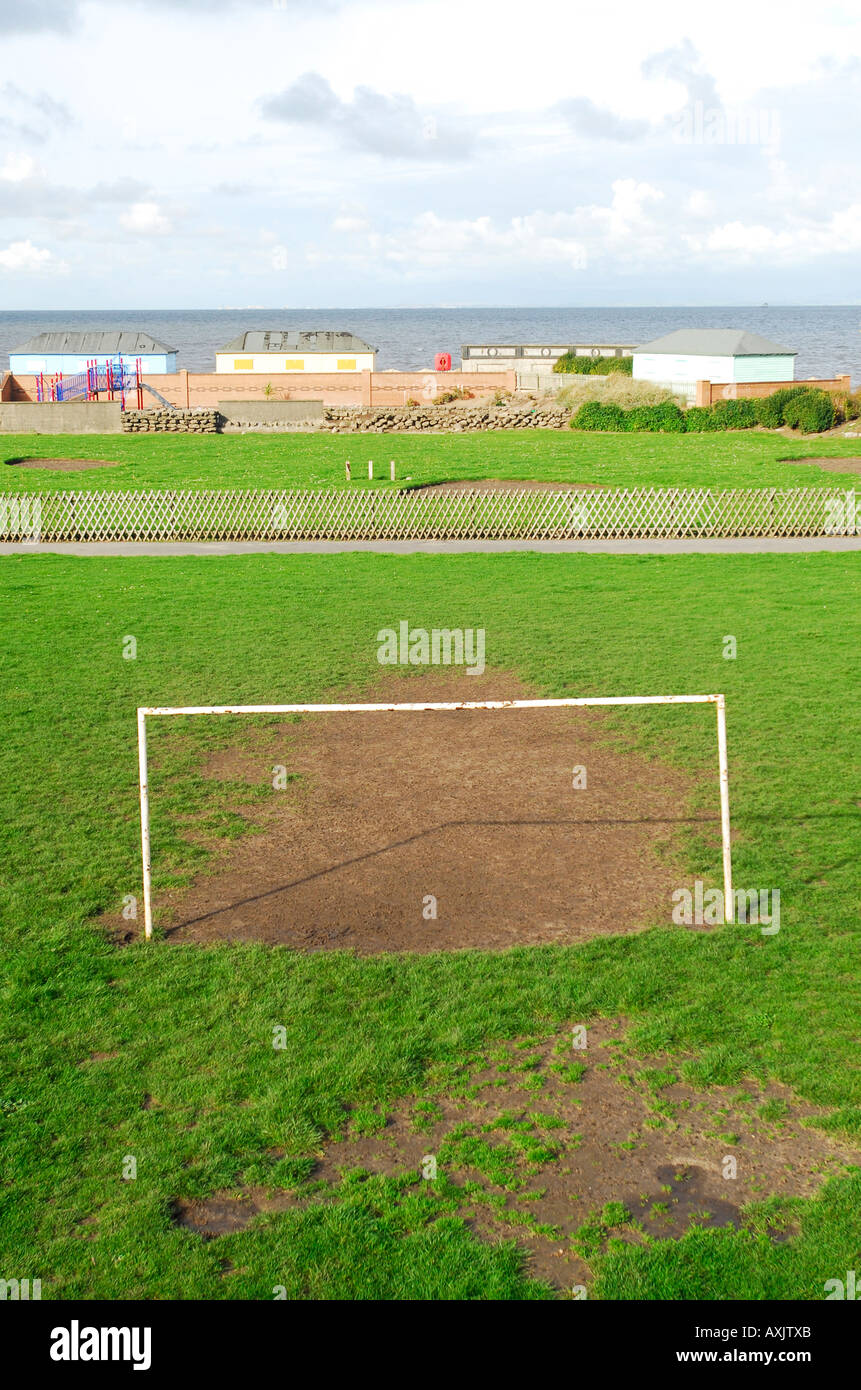 Goal posts on field next to sea Fleetwood Stock Photo - Alamy
