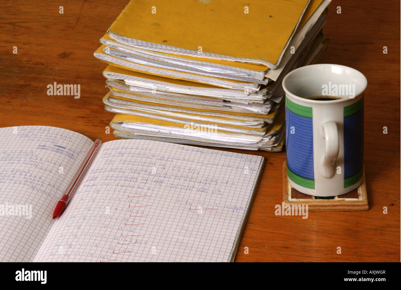 Marking homework, red pen and coffee Stock Photo - Alamy