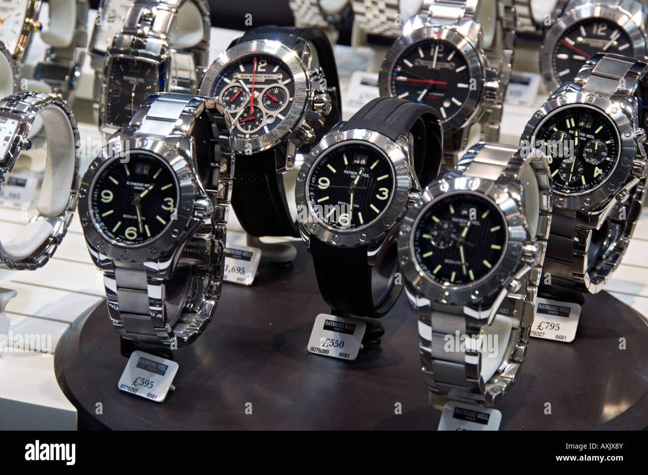 Designer watches in London shop window Stock Photo - Alamy