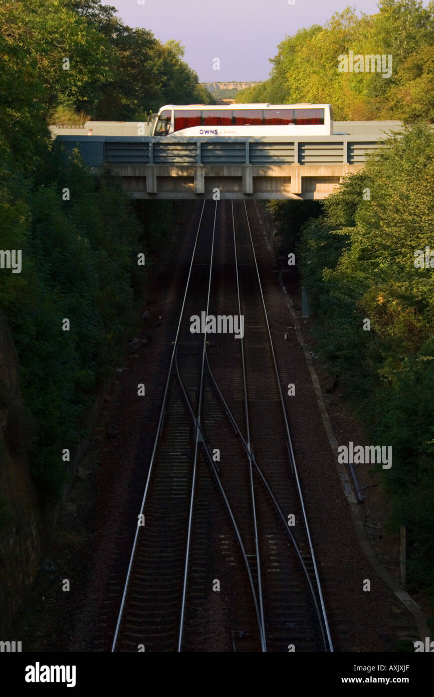 A highway with traffic crossing over a railroad line Stock Photo - Alamy