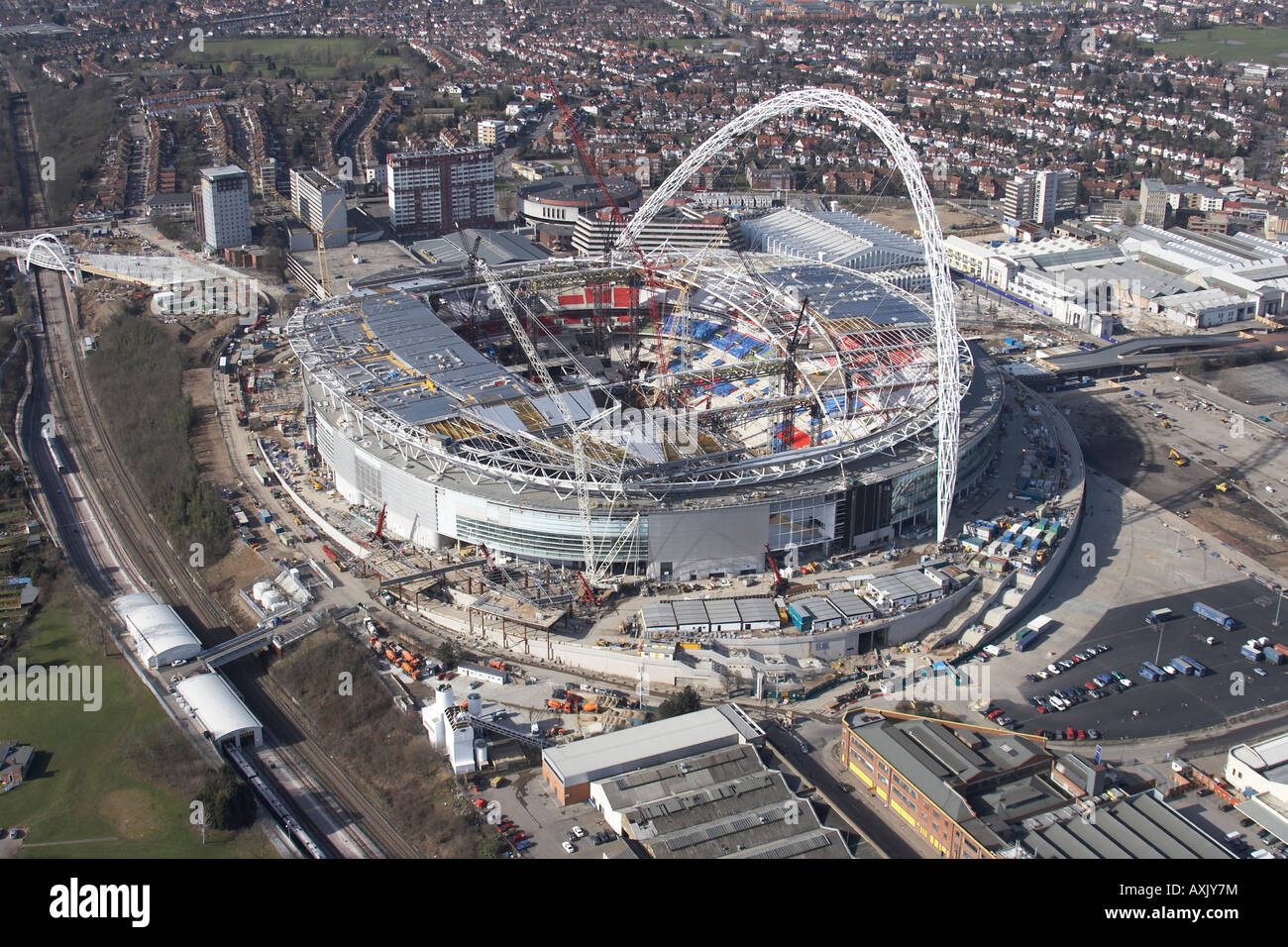 High level oblique aerial view west of Wembley Stadium building ...
