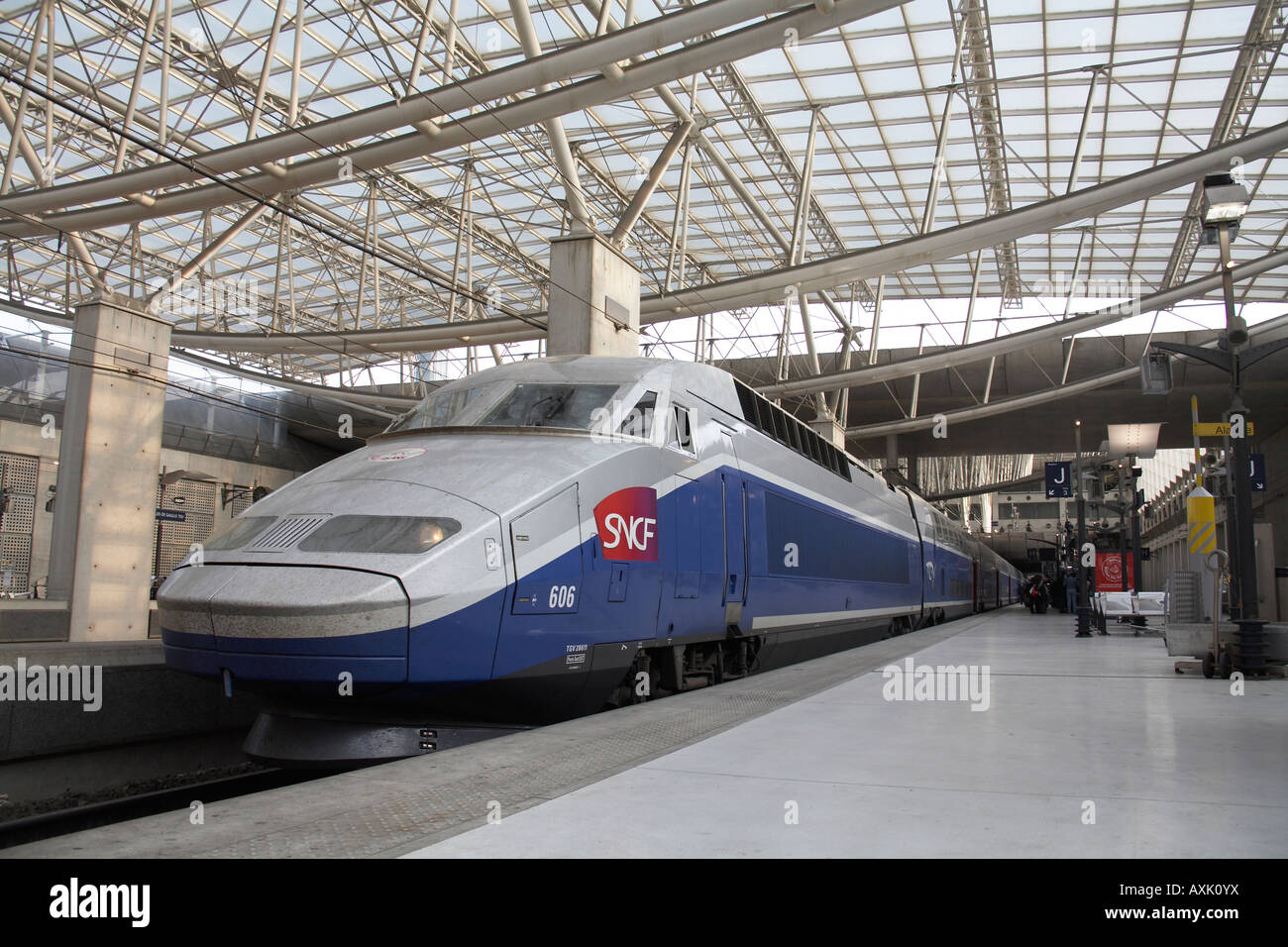 SNCF train with passengers on platform in TGV railway station at Stock ...