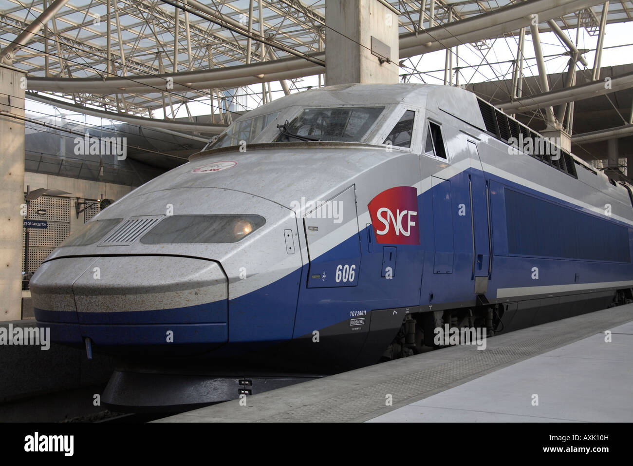 Dirty SNCF train on platform in TGV railway station at Charles De ...