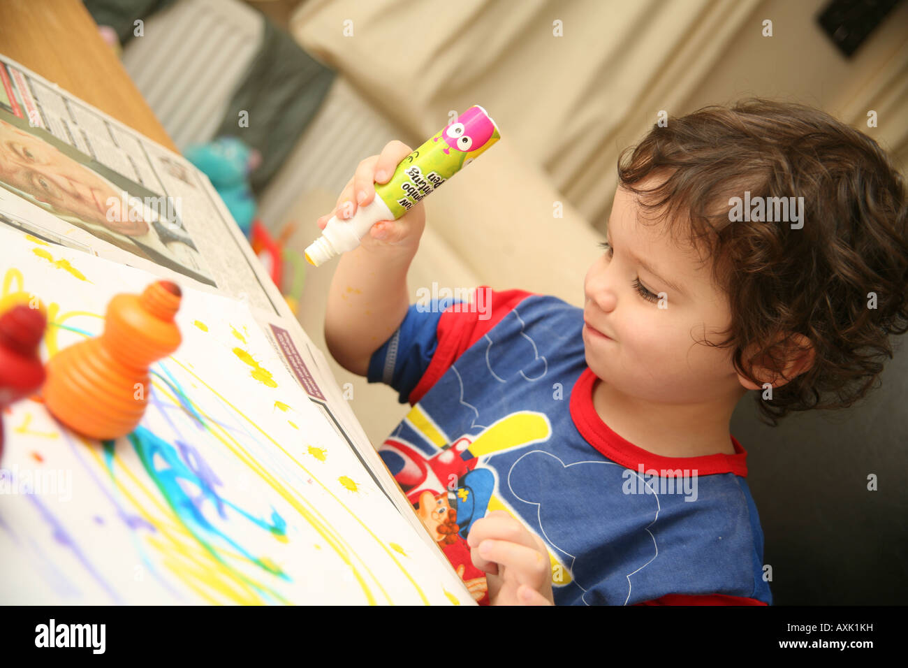 Little boy drawing Stock Photo - Alamy
