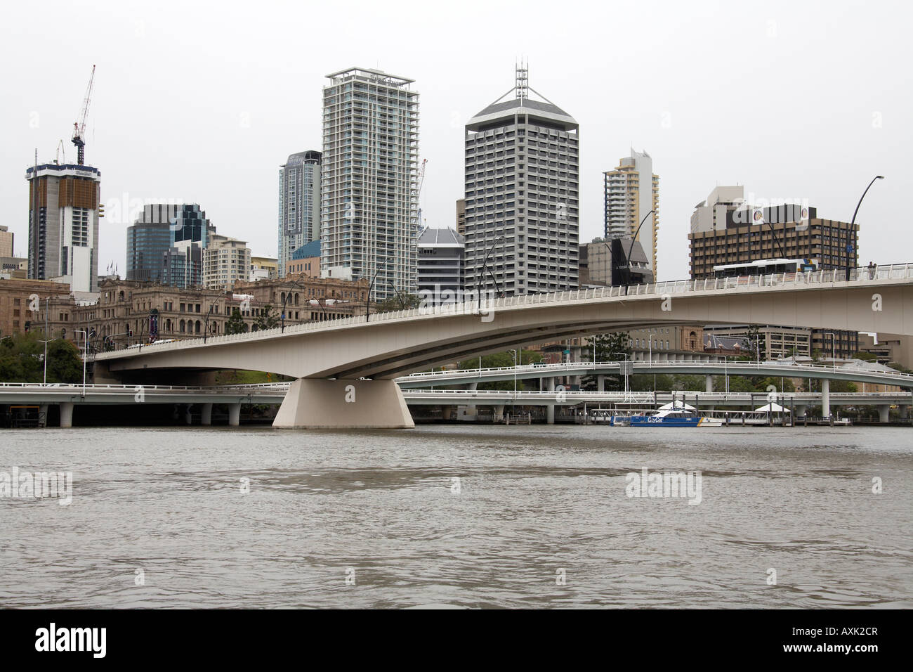 City centre business district buildings skyline beyond Victoria Bridge ...