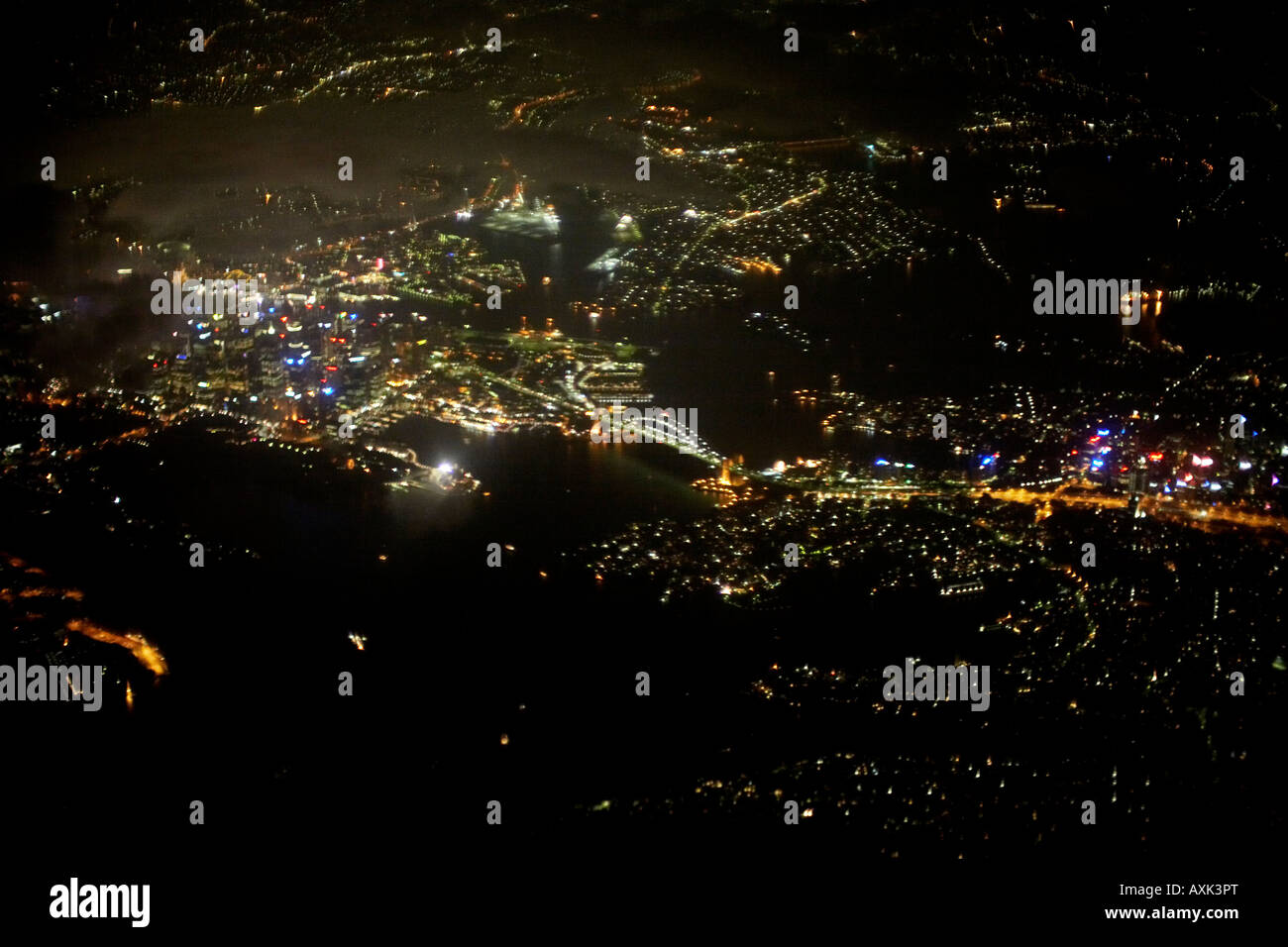 High level oblique aerial view south west at night from commercial ...