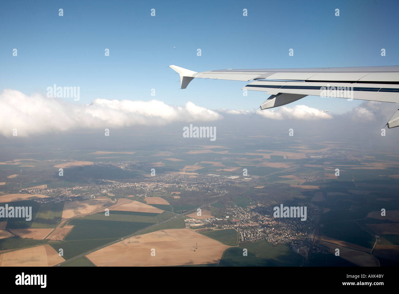 Aerial view of Frency countryside from the air with cumulus clouds and ...