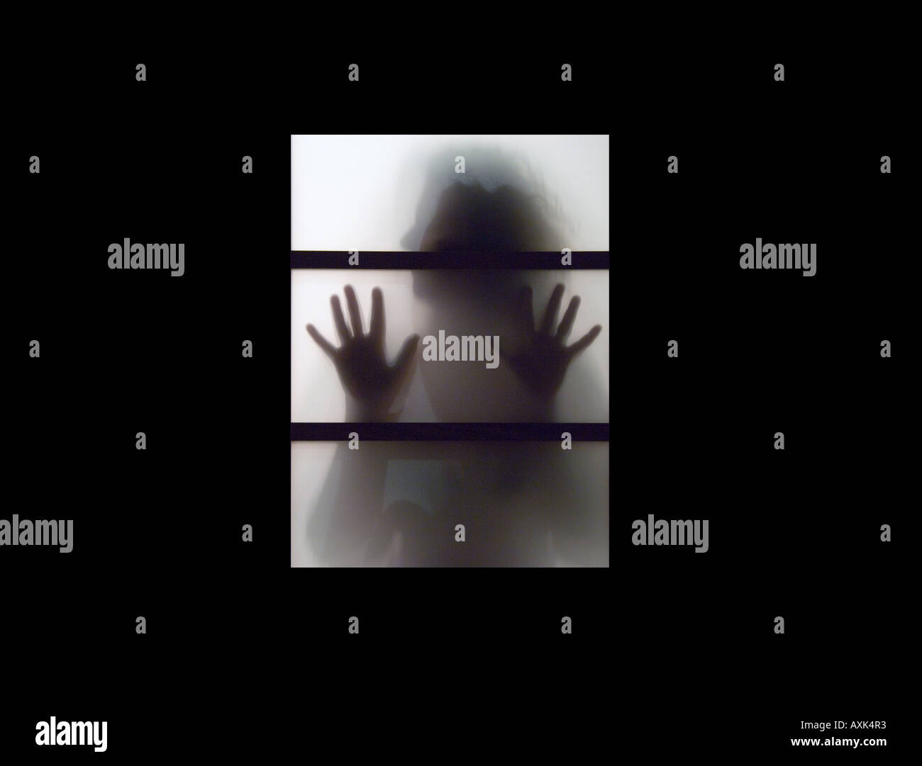 Woman behind window bars hi-res stock photography and images - Alamy