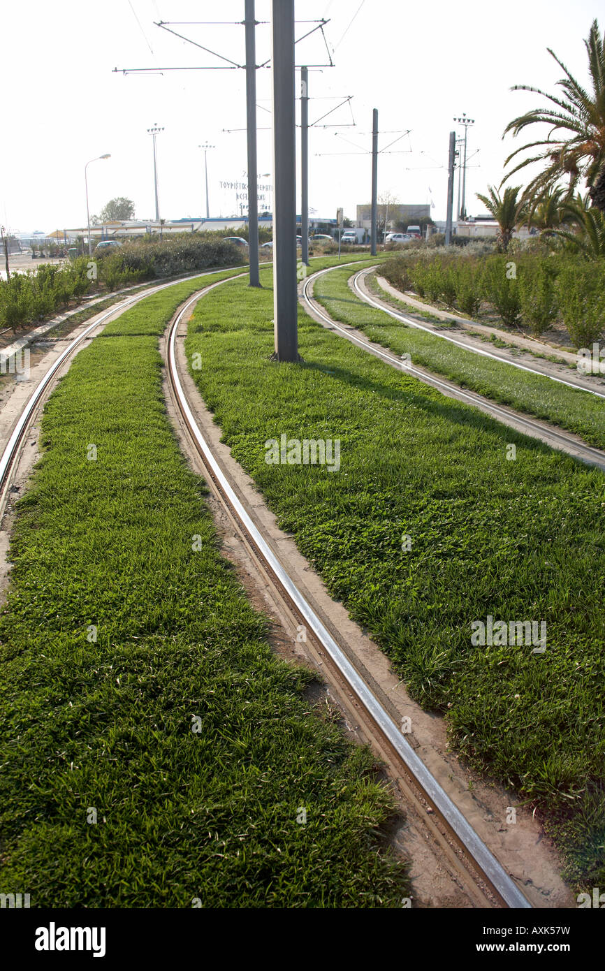 Ecological green grass planted between tramway track lines in Glifada ...