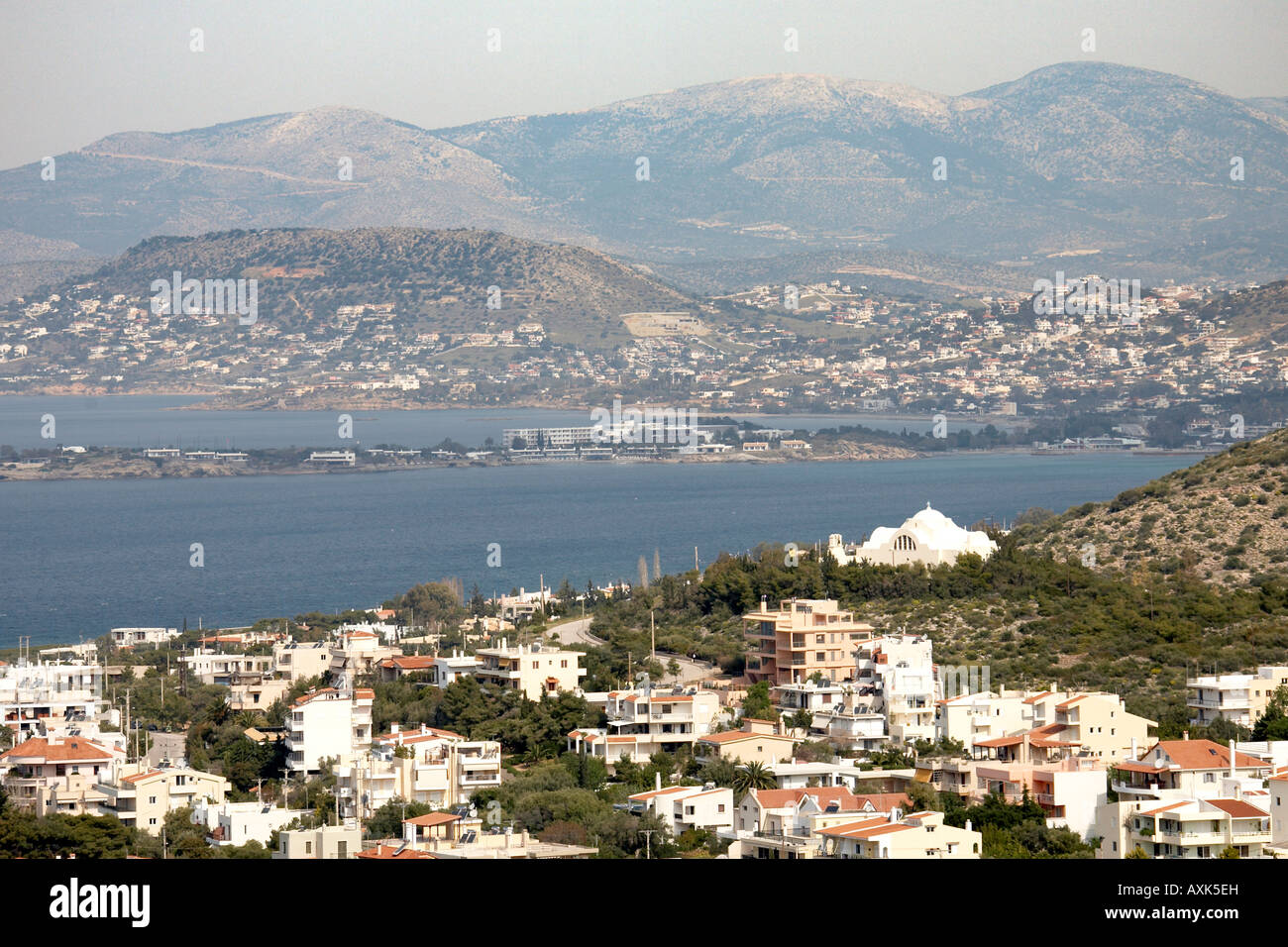 Greek Orthodox church in Saronida with sea and Lagonissi beyond in ...