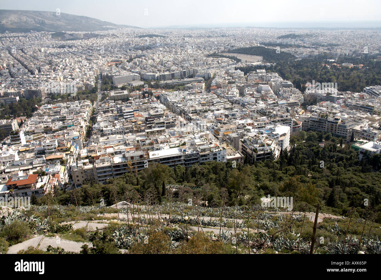 High level view south to sea over suburbs and buildings from Likavitos ...