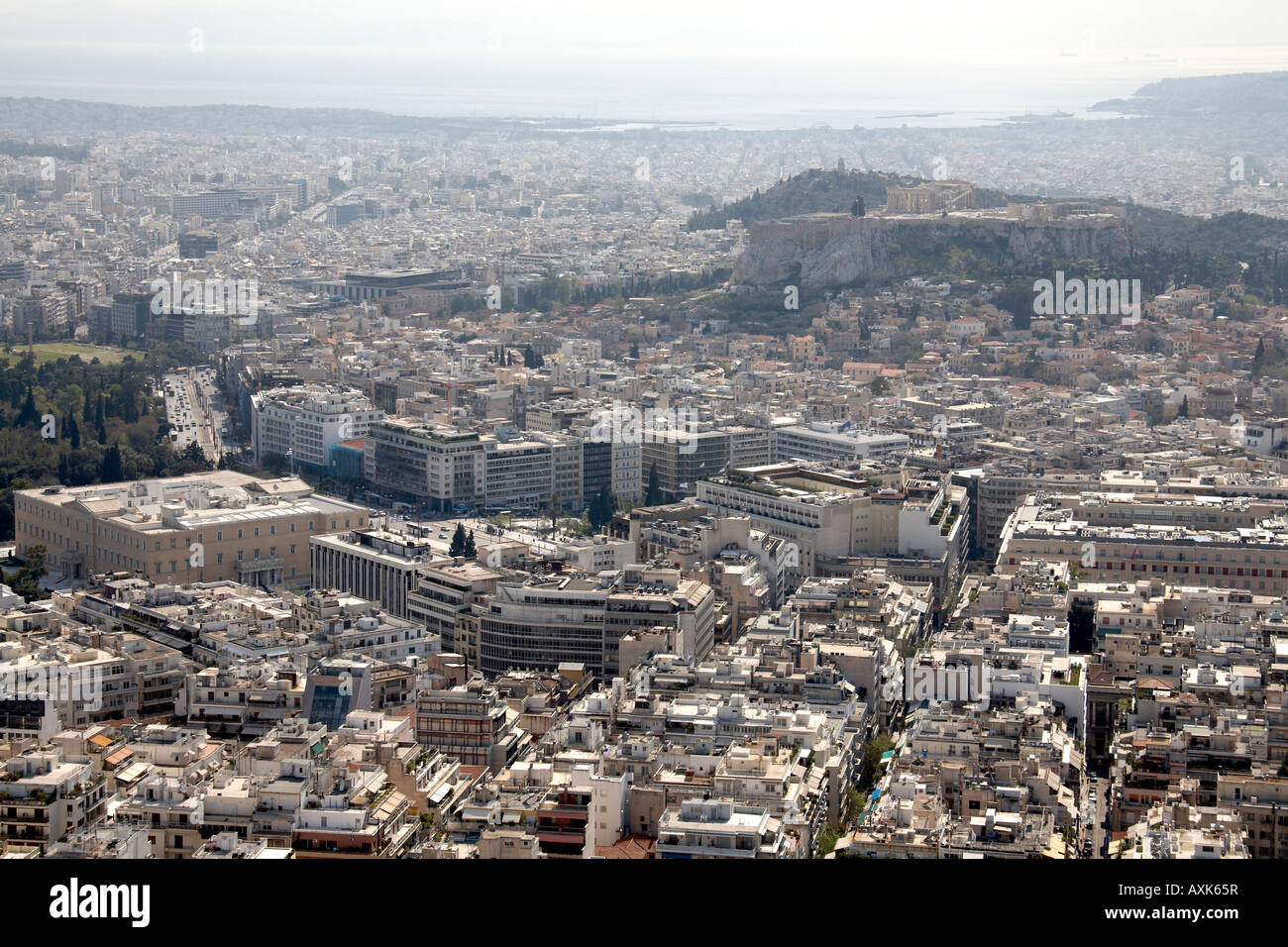 High level view south west to Acropolis and sea over suburbs and ...