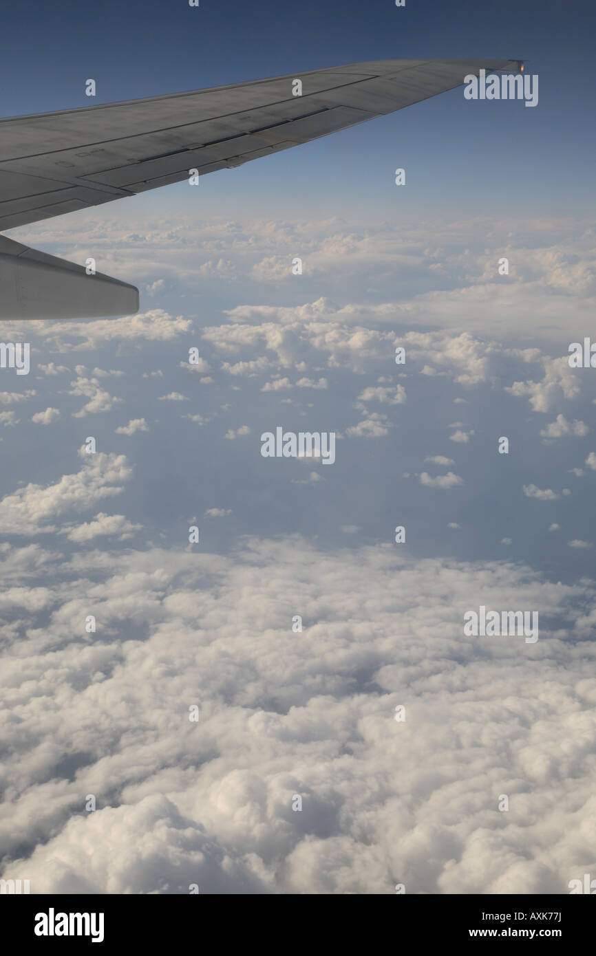Wing of Plane in Sky Stock Photo - Alamy