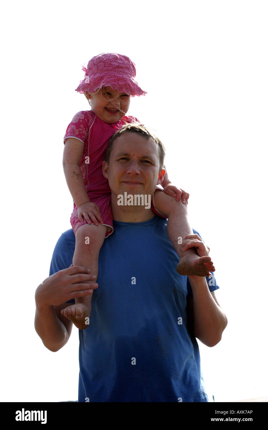 Daughter sitting on dads shoulders hi-res stock photography and images ...