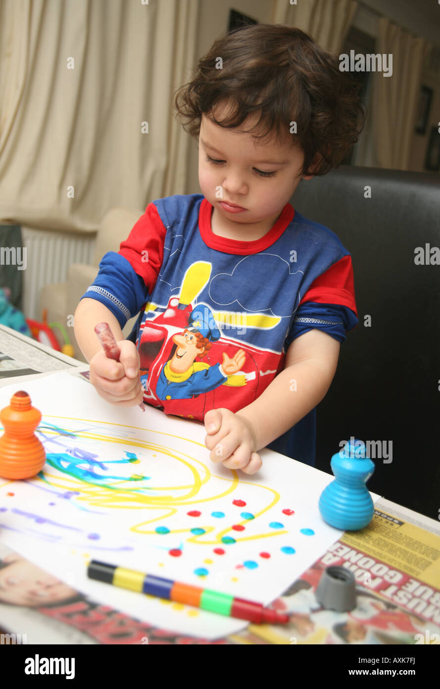 Little boy drawing Stock Photo - Alamy