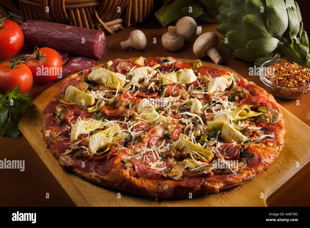 Italian pizza round circular cloves wood cutting board tomatoes ...