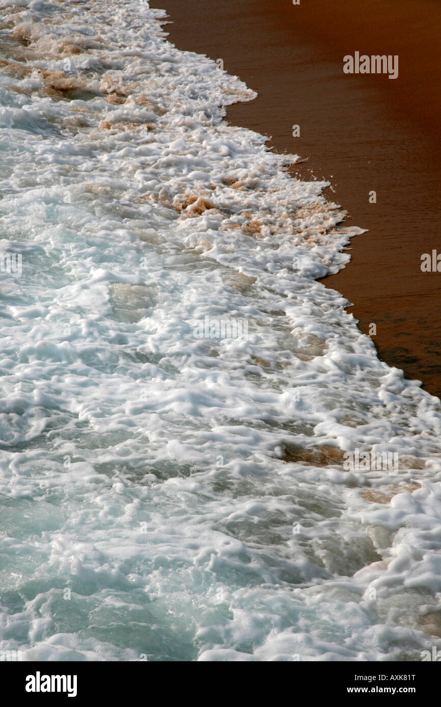 white waves on the beach Stock Photo - Alamy