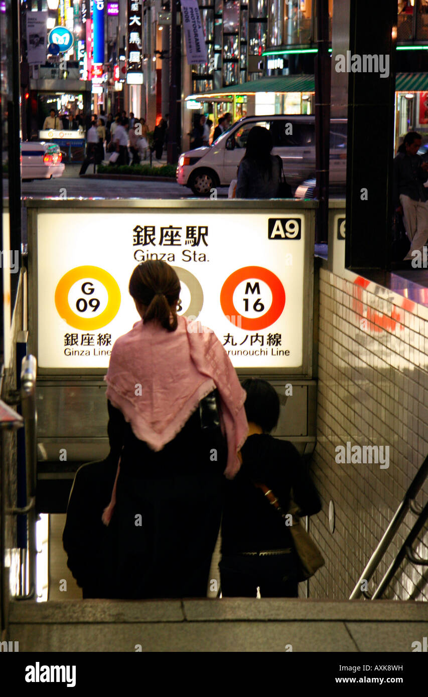 Ginza Line Metro Station entrance with people and traffic, Tokyo, Japan ...