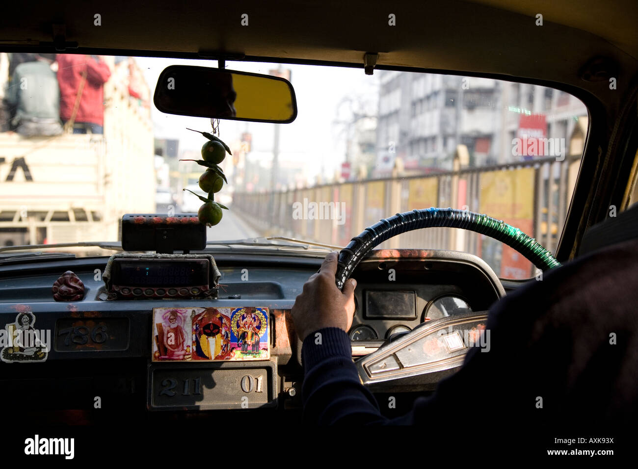 Looking inside of a yellow taxi in Kolkata Stock Photo - Alamy