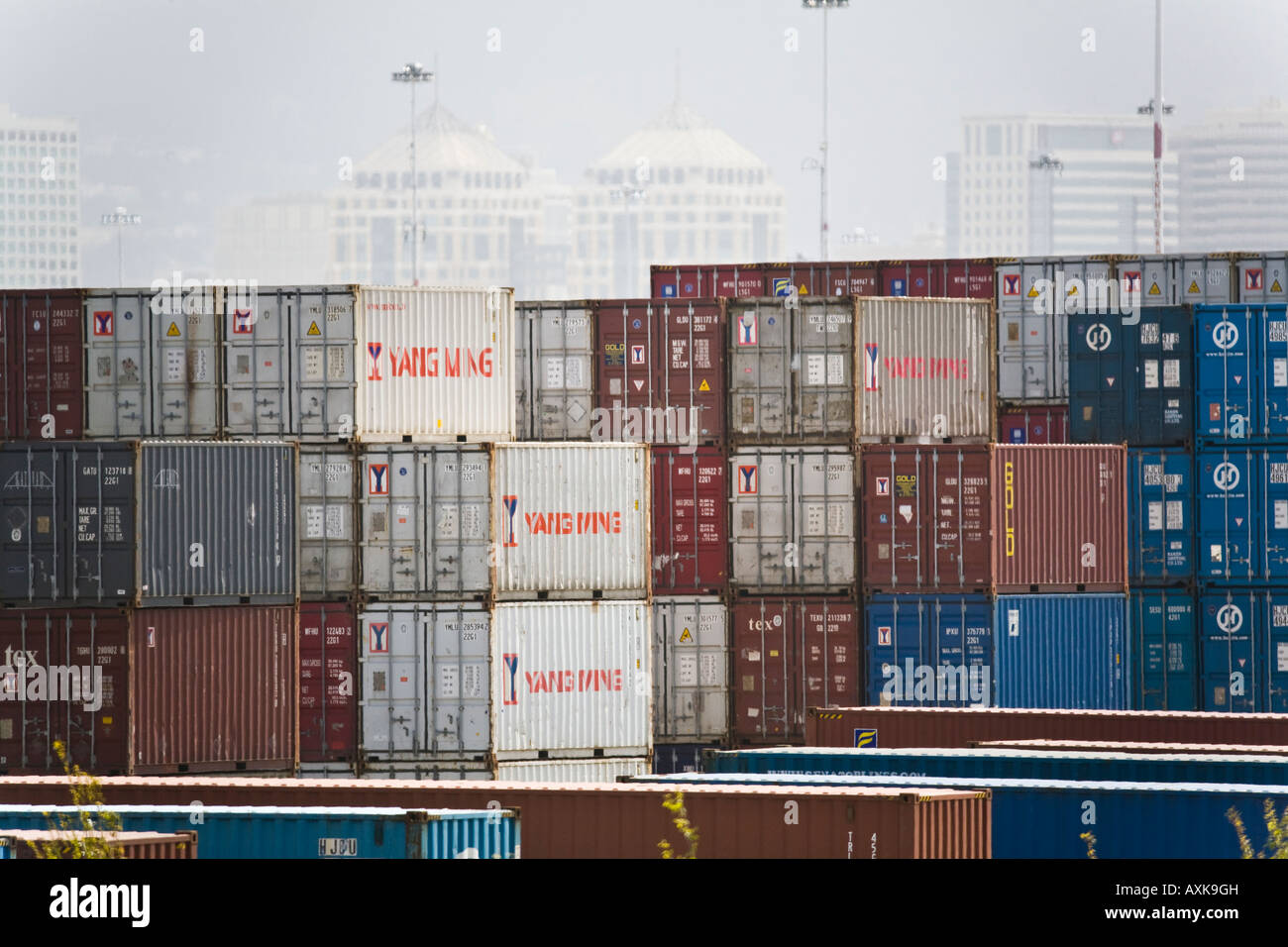 shipping containers stacked at the port of oakland Stock Photo - Alamy