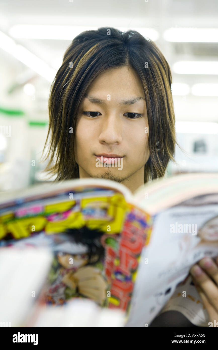 Adult reading comics hi-res stock photography and images - Alamy