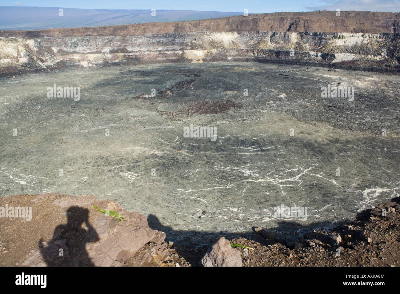 Shadow of photographer photographing the Halema uma u Crater in the ...