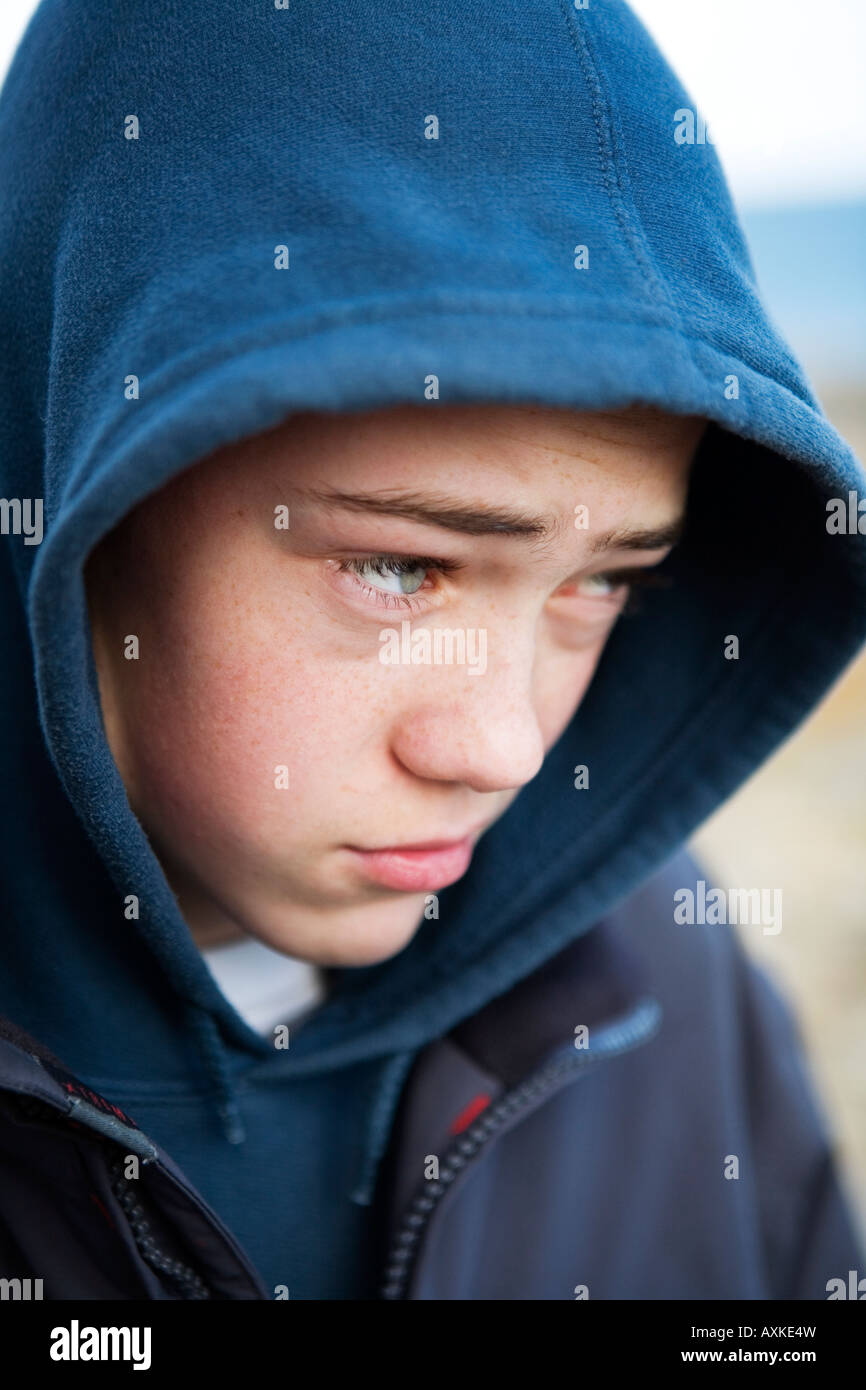 teenage boy looking moody Stock Photo - Alamy