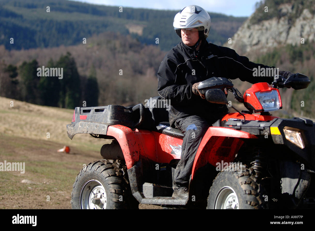 Quad bike riding and instruction in Dunkeld Scotland 12 03 2008 Stock ...