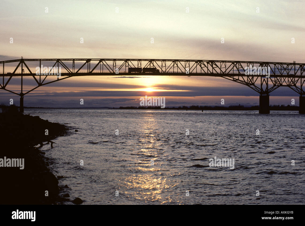 A truck crosses the Umatilla Bridge made of steel trusses over the ...