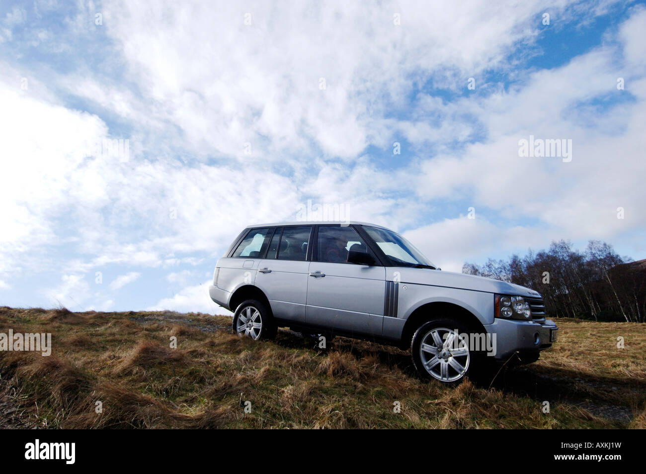 Land Rover 4 x 4 experience driving in Dunkeld Scotland Stock Photo - Alamy