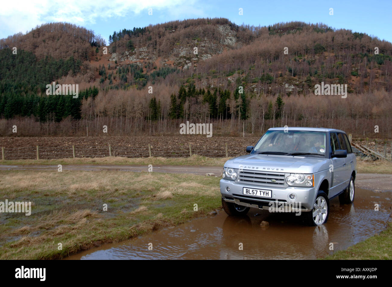 Land Rover 4 x 4 experience driving in Dunkeld Scotland Stock Photo - Alamy