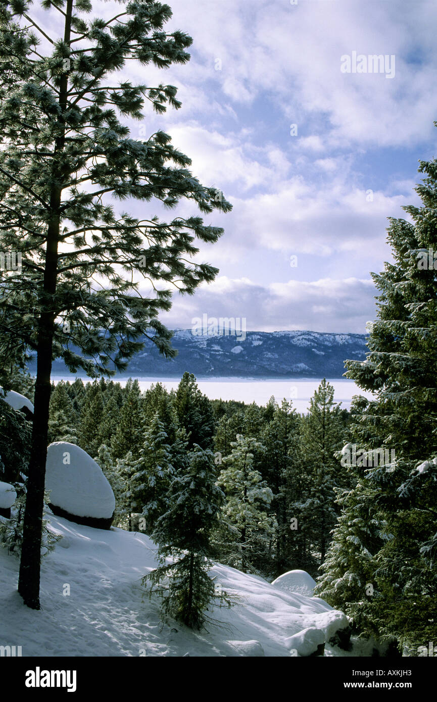 A snowy winter scene in the mountains of Central Idaho Cascade lake in ...