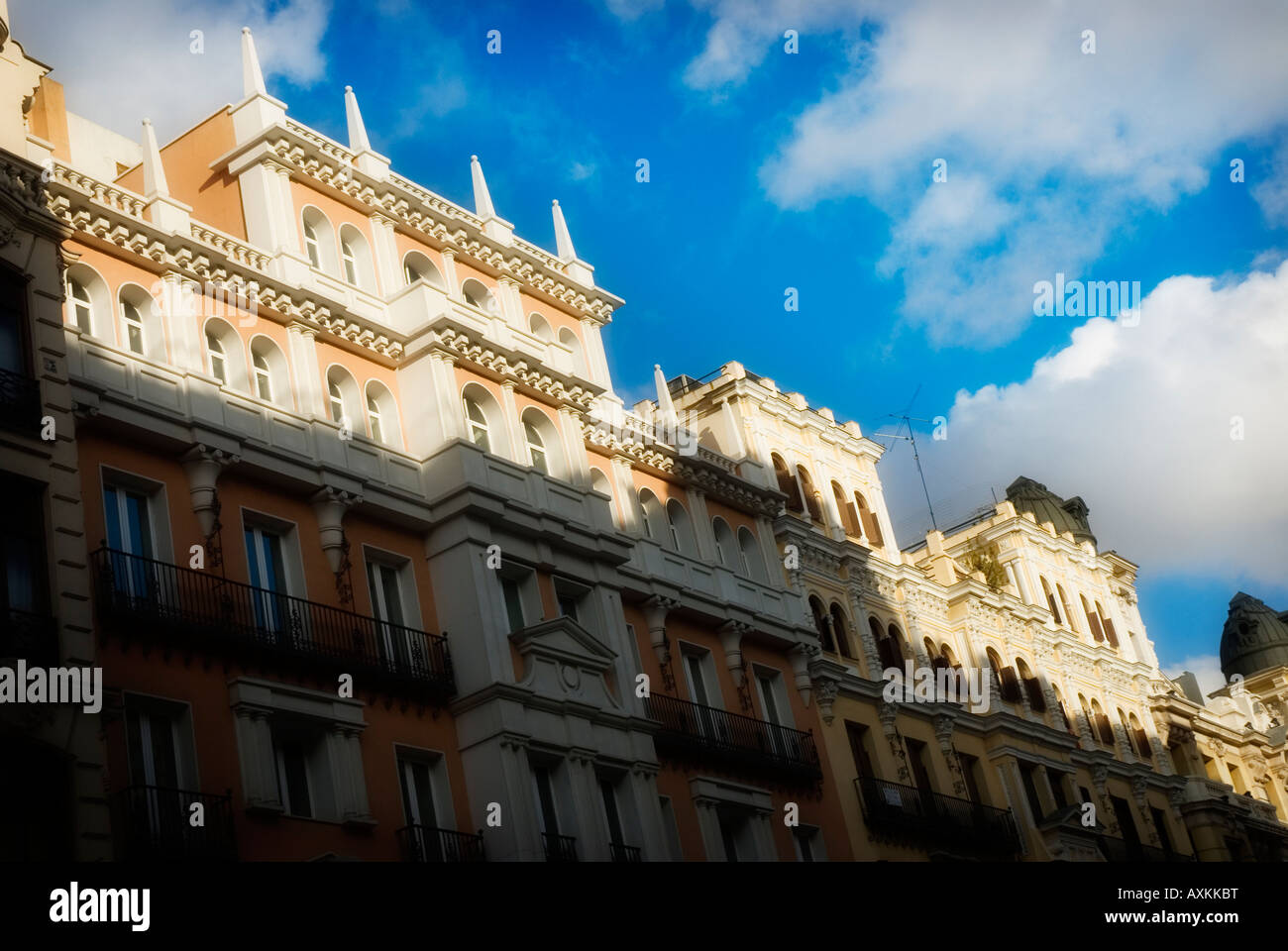 Buildings in Madrid City centre Spain lit by warm late afternoon sun ...