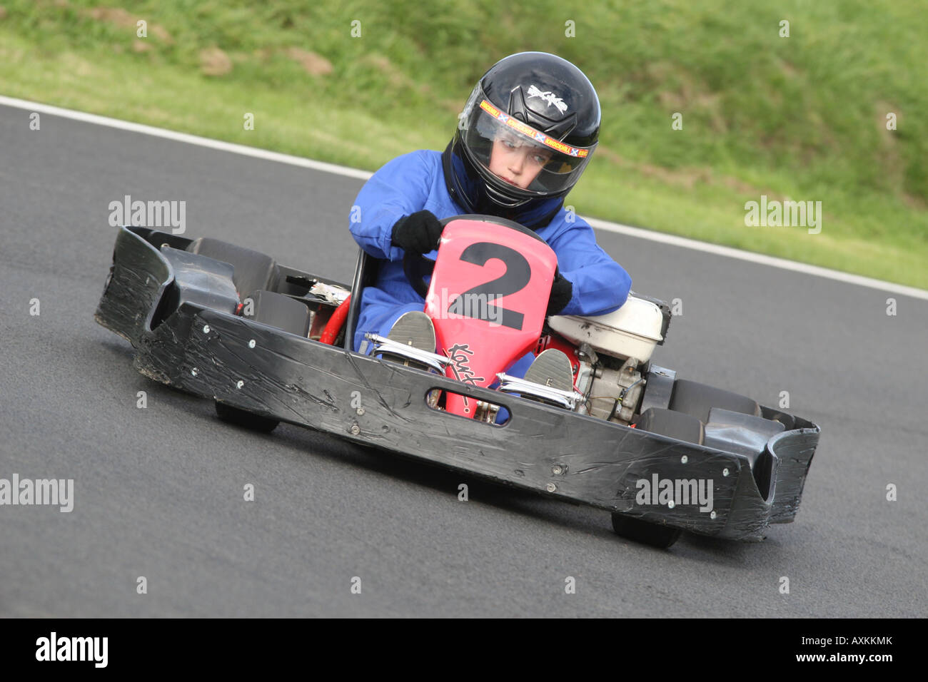A young boy driving a kart at knockhill racing circuit in fife Stock ...