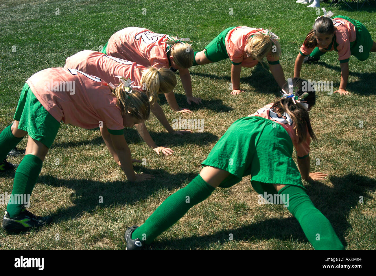 girl s soccer stretching Stock Photo - Alamy