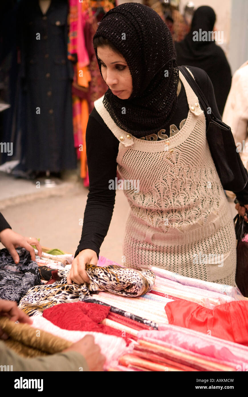 Libyan woman shopping in the Medina or Old Town Tripoli Libya Stock ...