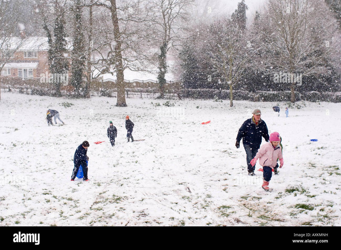 Children playing in snow uk hi-res stock photography and images - Alamy