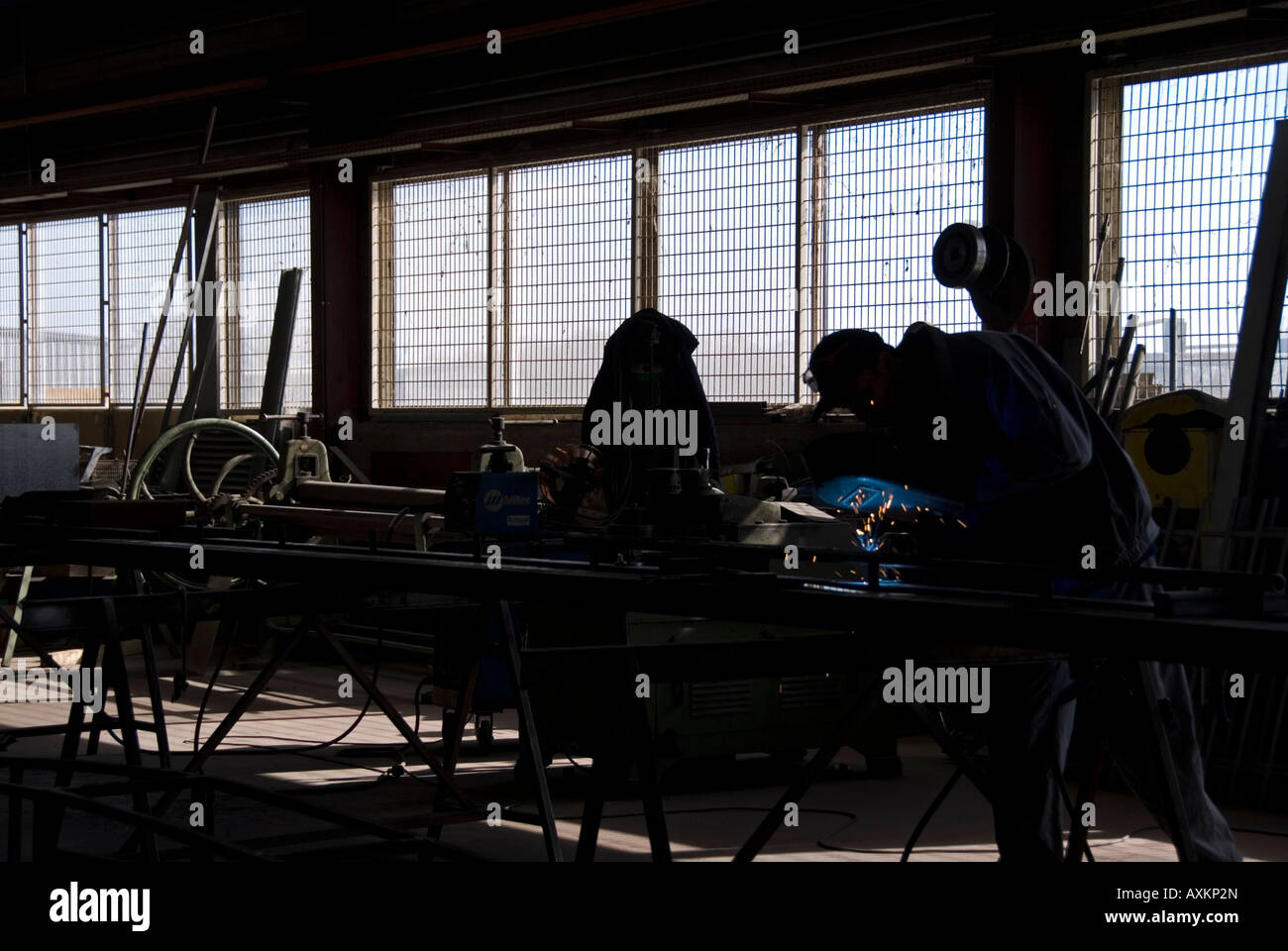 Stock photo of a factory worker Arc Welding metal together The photo ...