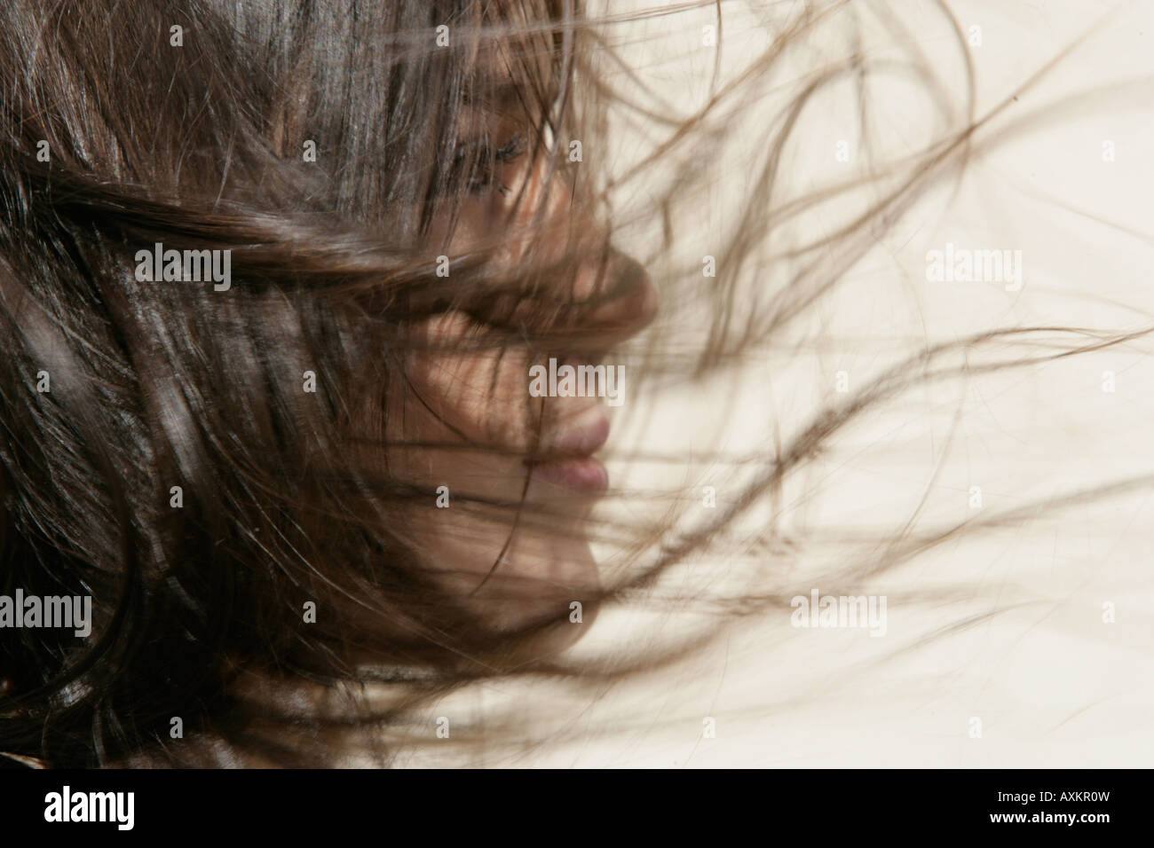 Girl with flying hair Stock Photo - Alamy