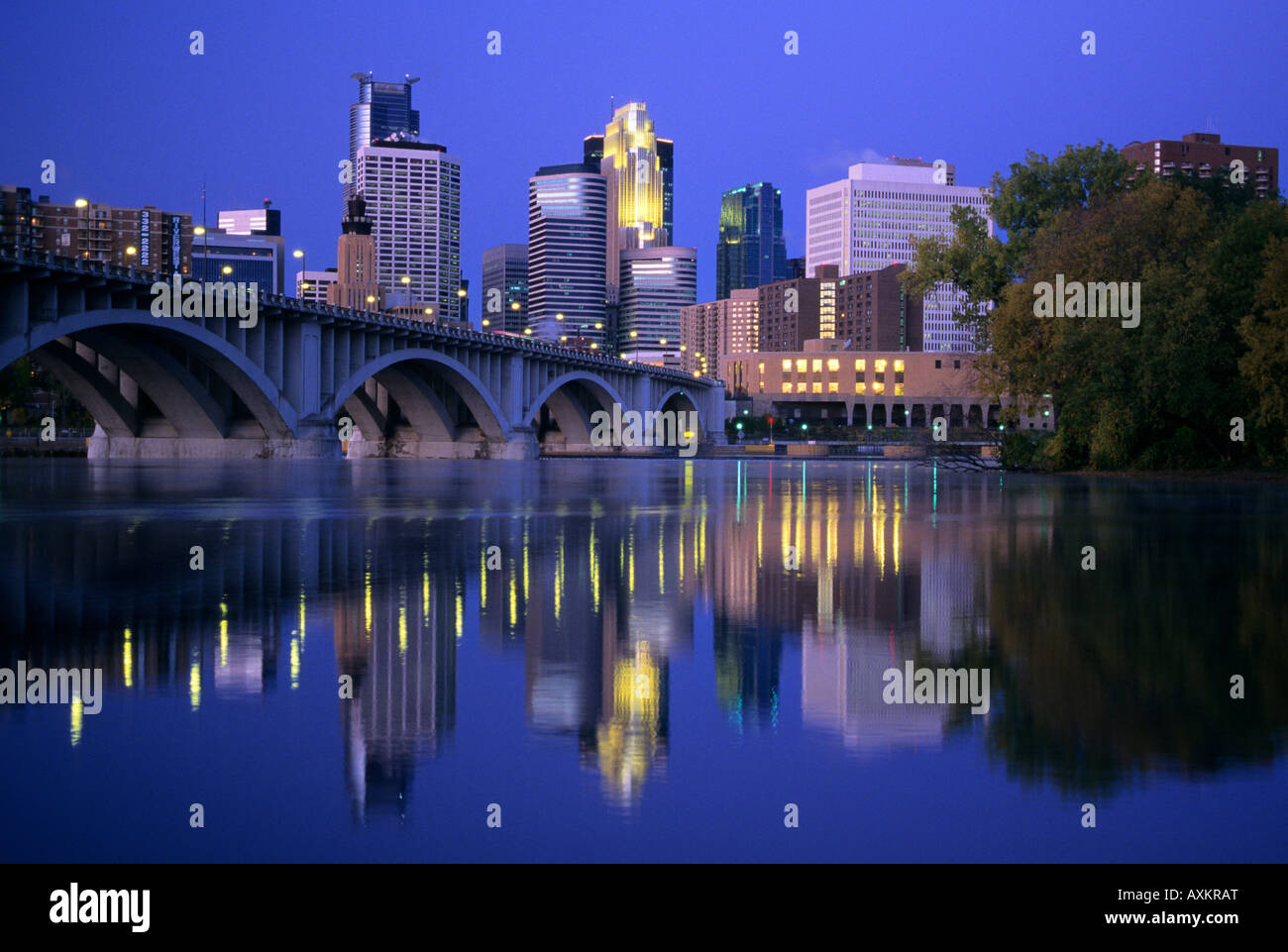 SKYLINE OF MINNEAPOLIS, MINNESOTA AND THE THIRD AVENUE BRIDGE OVER THE ...