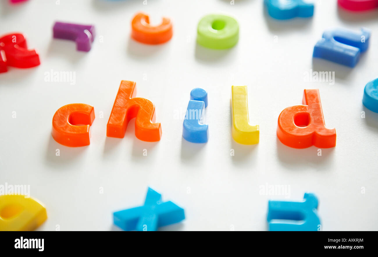 Alphabet magnetic childrens learning letters spelling out Child Stock ...