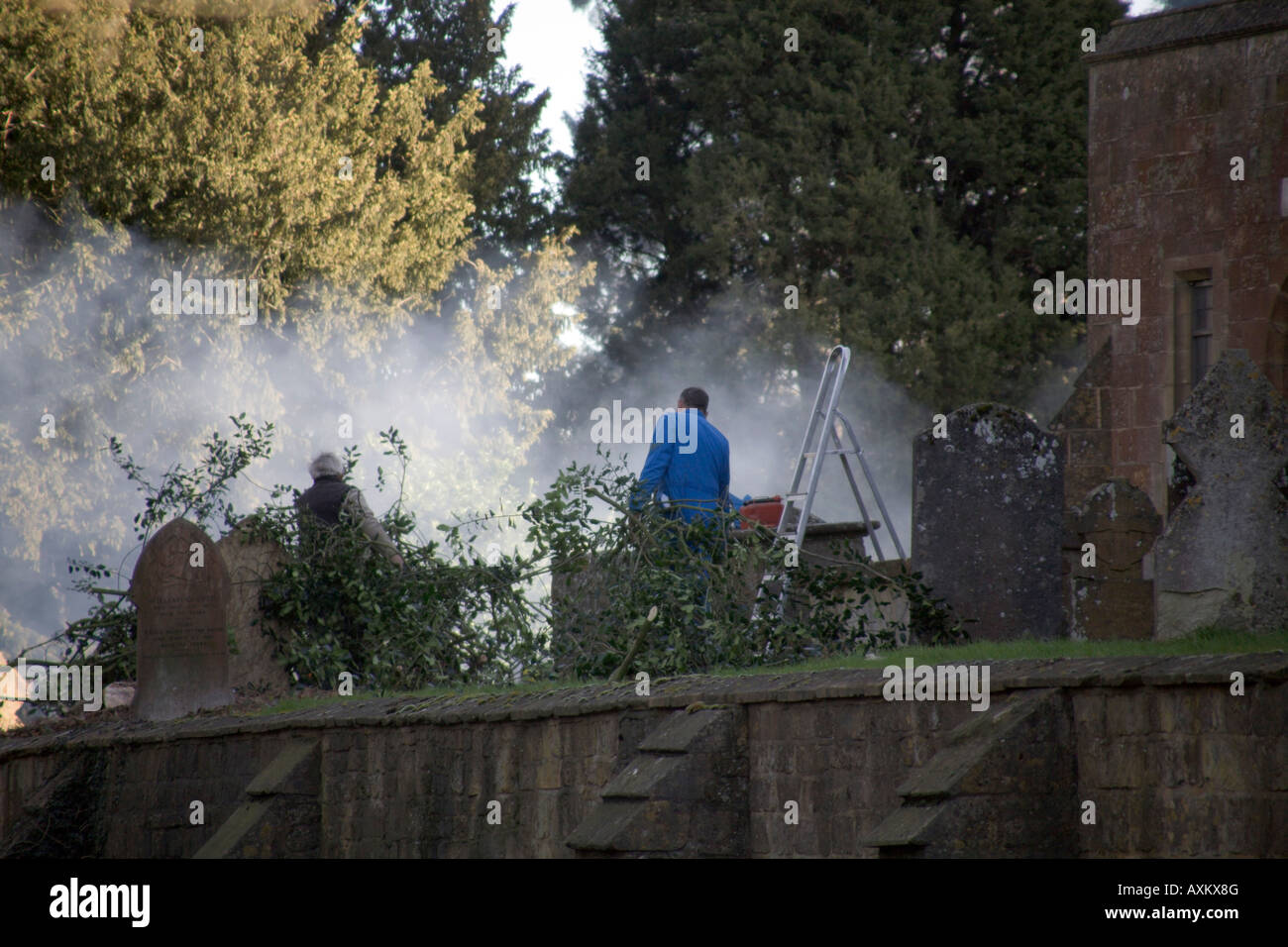 Smoke in an english graveyard Stock Photo - Alamy