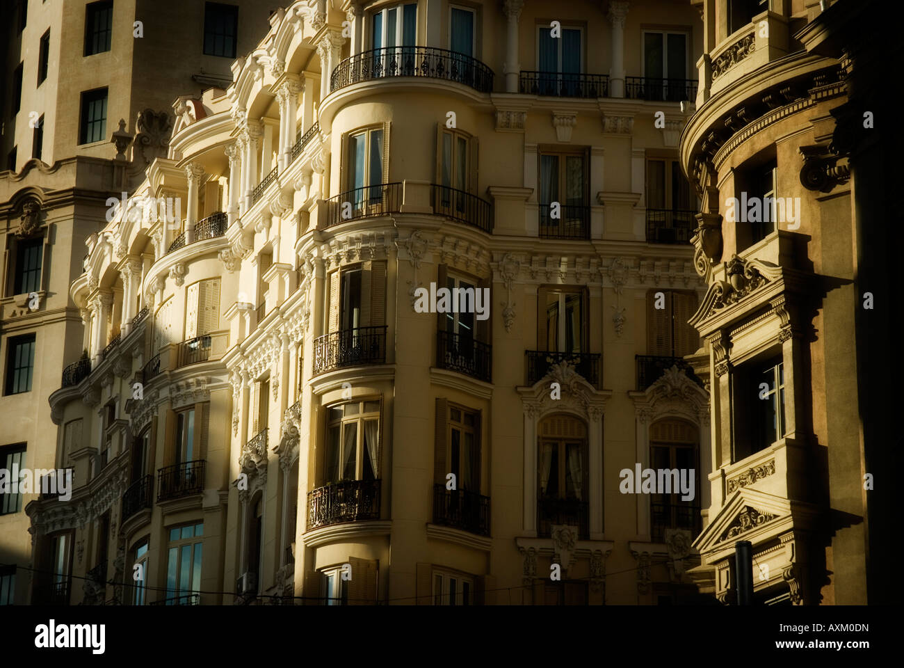 Buildings in Madrid city centre Spain lit by warm late afternoon sun ...
