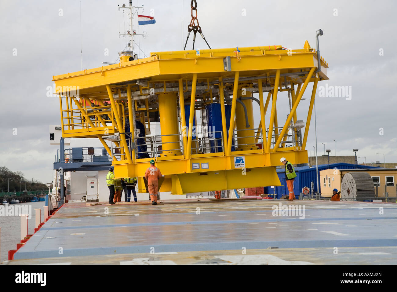 Rig platform being loaded onto container ship at Yarmouth Stock Photo ...